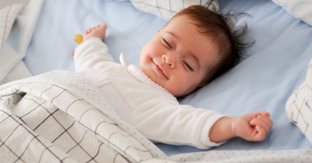 Why Do Babies Smile While Sleeping?